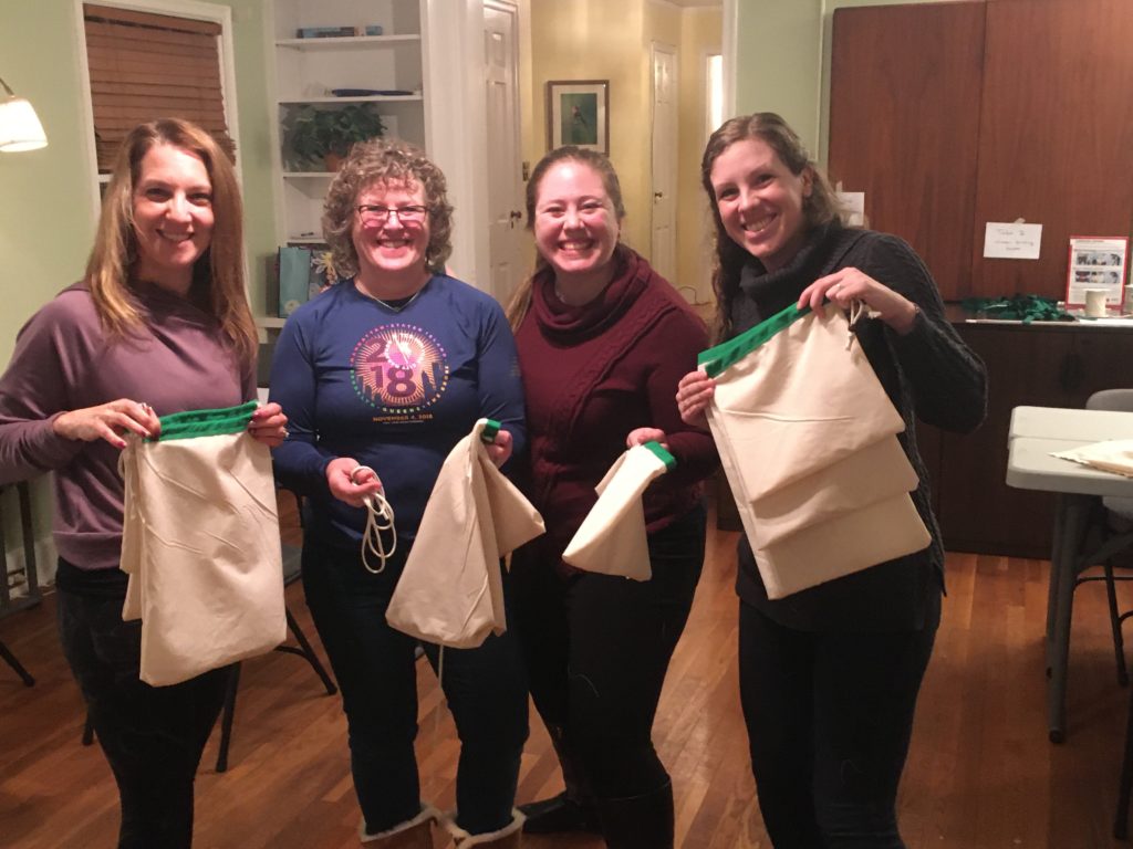 Michelle Carucci, Julie Dresser, Kelly Vogt, Alex Thorpe with produce ...
